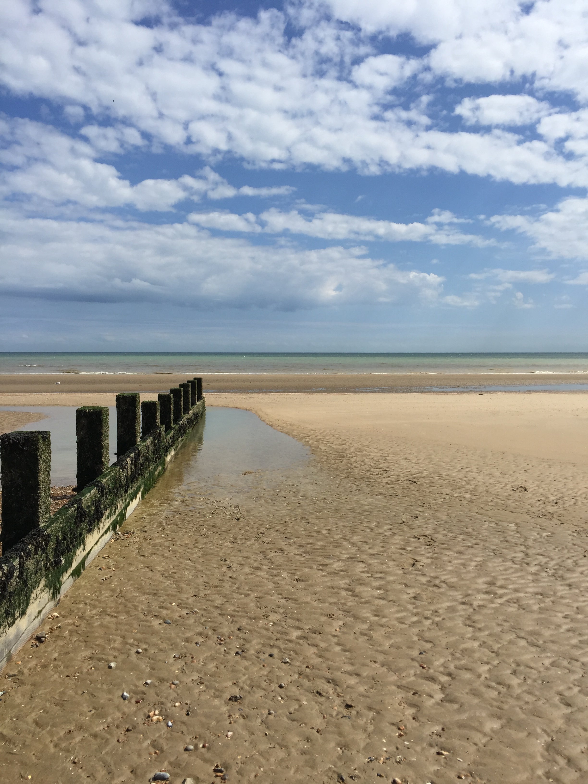 Engaging in doll play : at the seaside – Polly had a Dolly